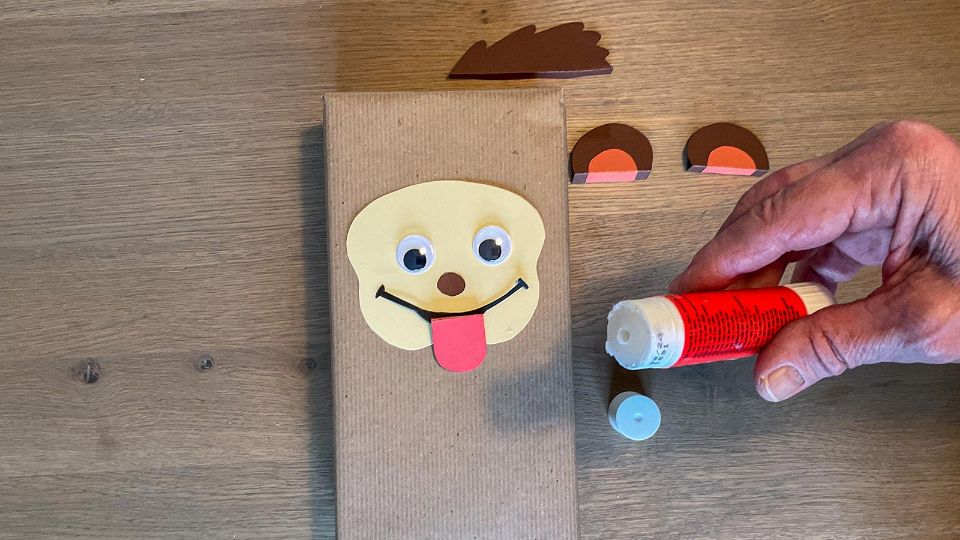 Geschenkverpackung mit hübschen Tiergesichtern | Famigros